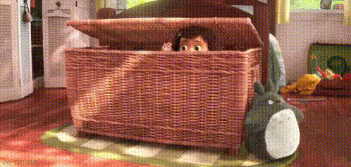 animated child hiding in wicker gif (in Animated GIFs)